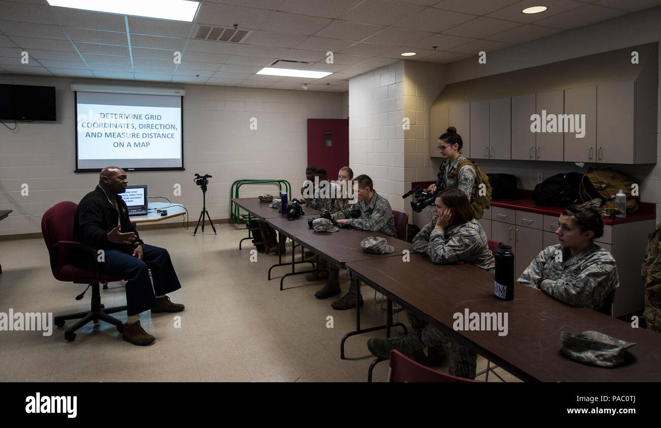 Mr. Robert A. Pickney teaches land navigation to U.S. service members ...