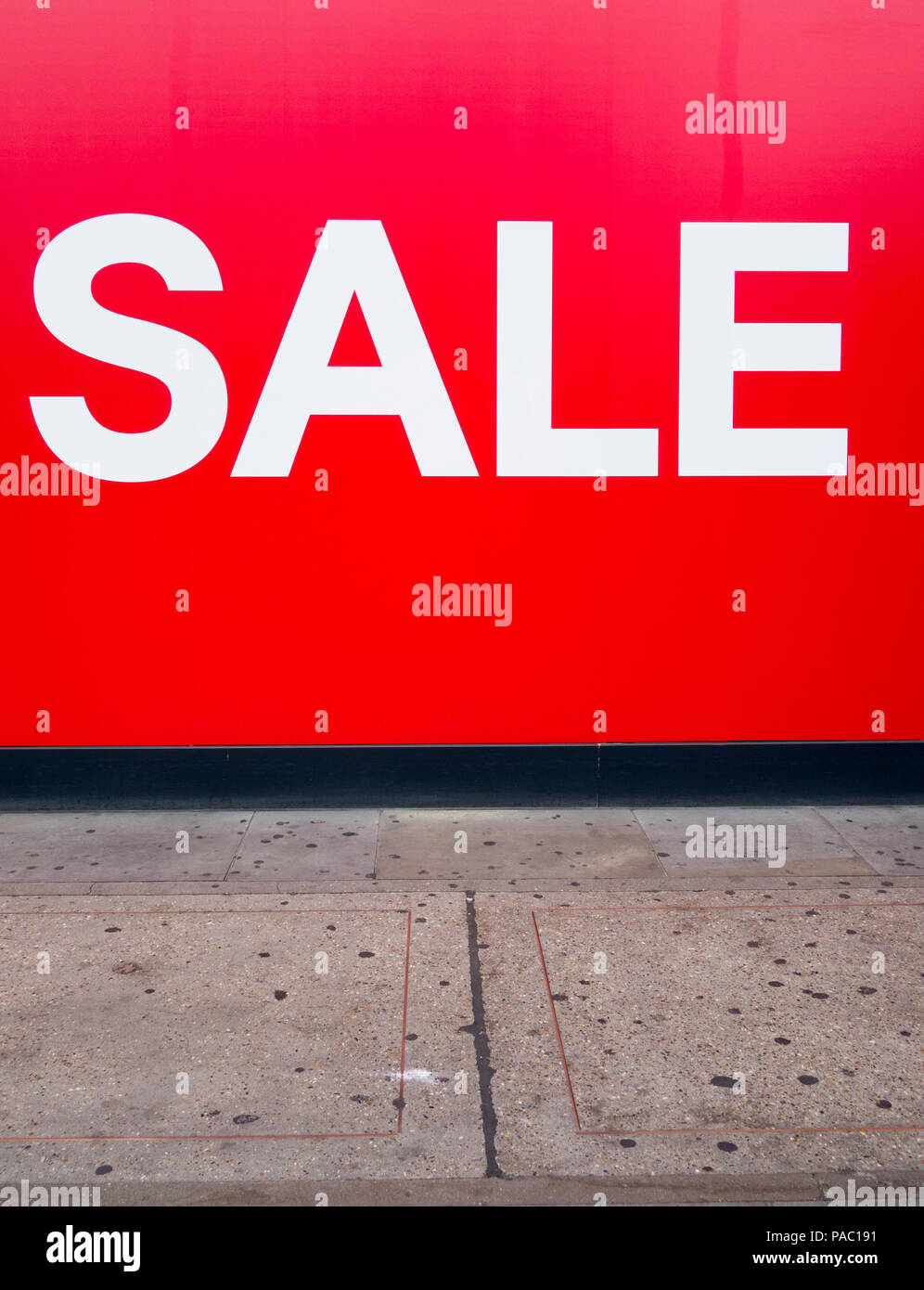 Bright red Sale sign on a London street Stock Photo - Alamy
