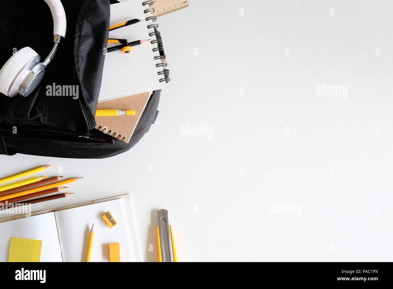 Back to school. Items for the school supplies on white table ready for ...