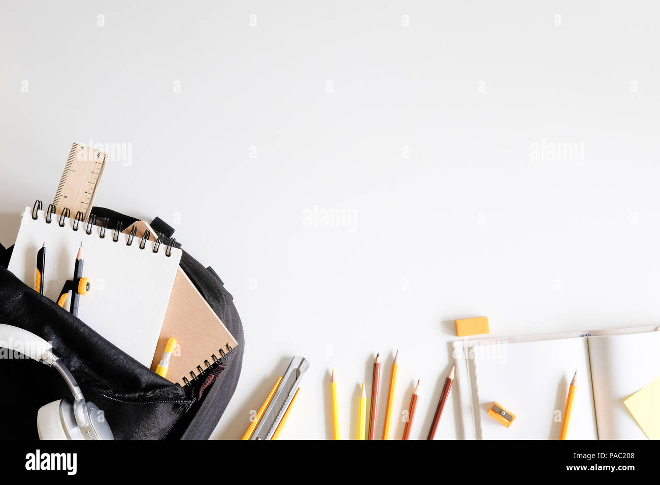Back to school. Items for the school supplies on white table ready for ...