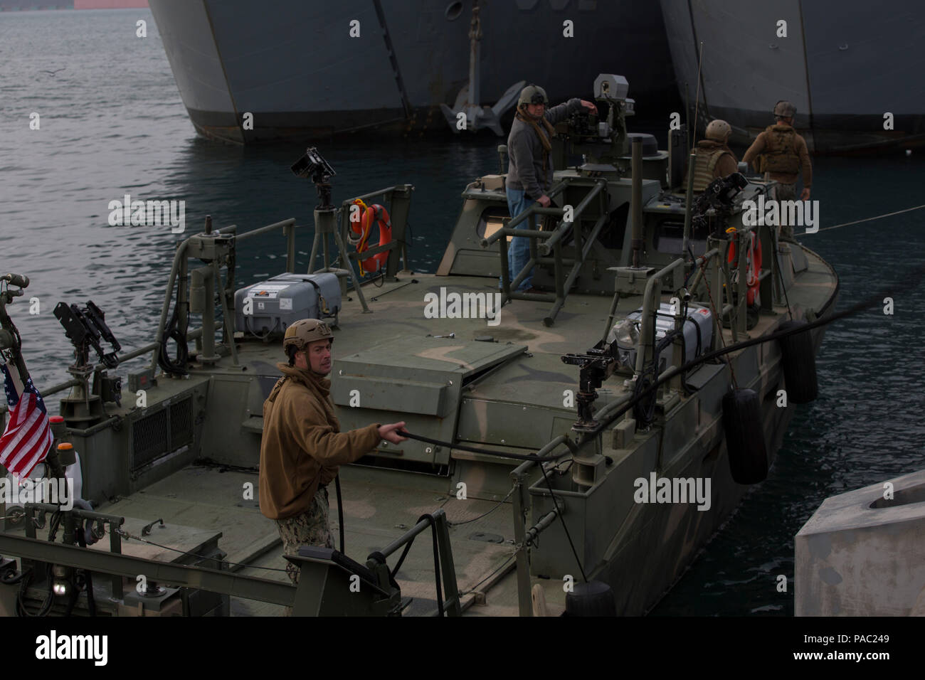 U.S. Navy Sailors with the Riverine Command Boat (RCB) Detachment ...