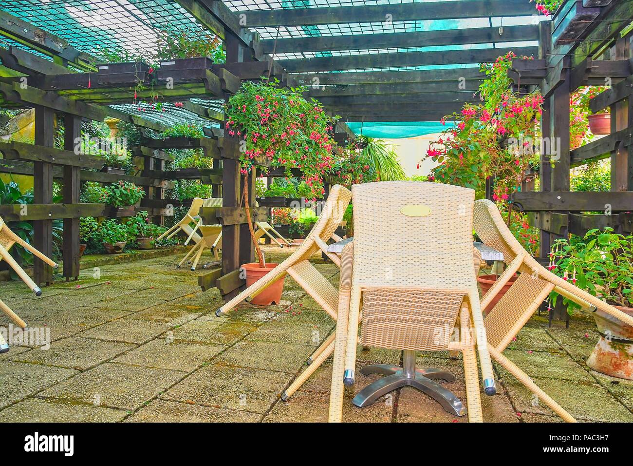 Closed cafe terrace in a small European city Stock Photo - Alamy