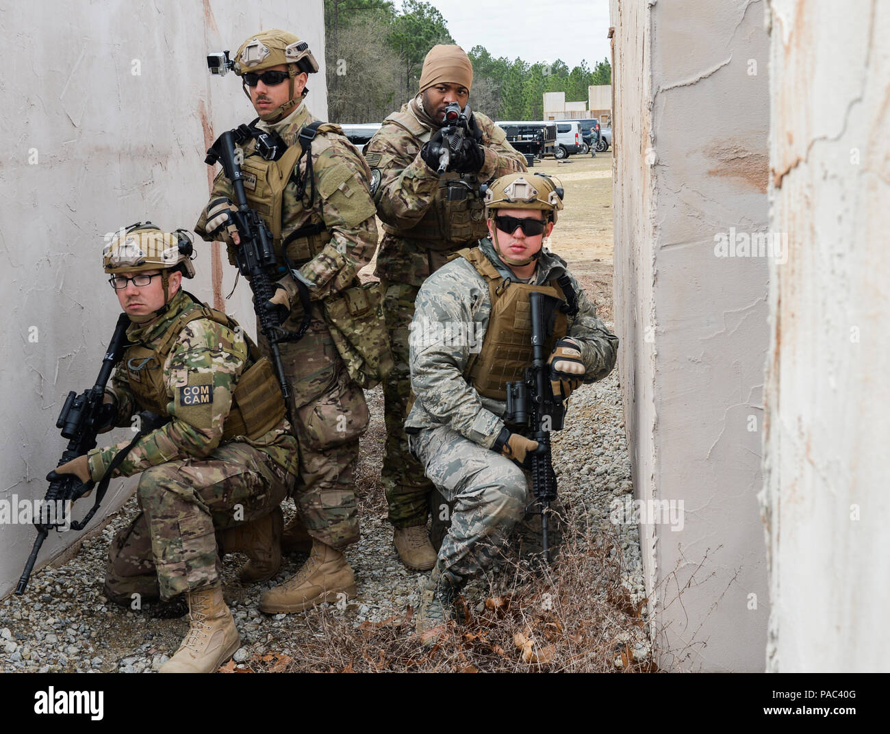 A group of U.S. Air Force combat camera Airmen practice movement over ...