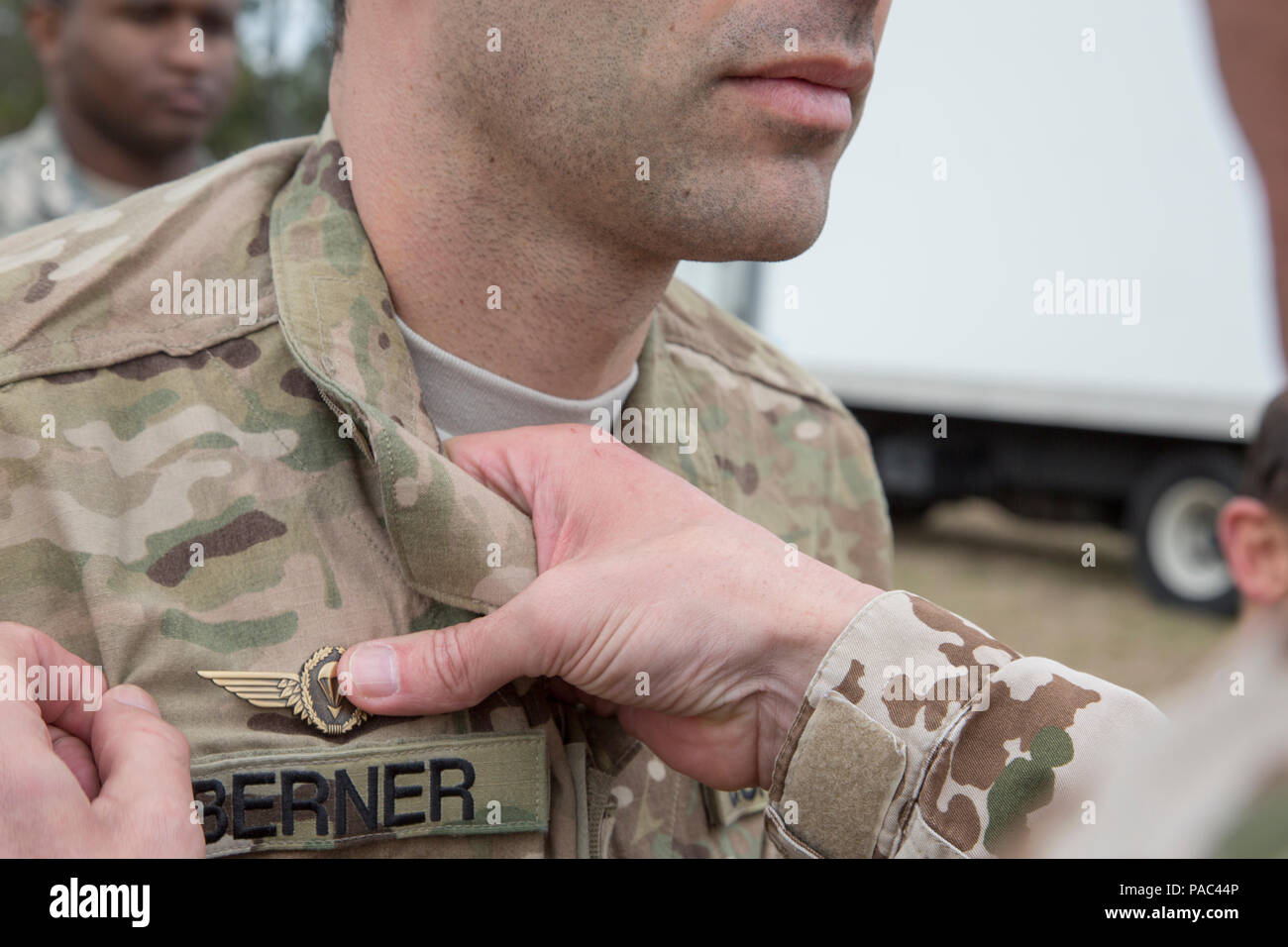 German Lt. Col. Frank Beyer, German Armed Forces liaison officer, pins ...