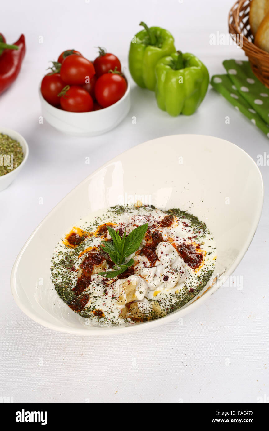 Traditional Turkish Food Manti Ravioli with Yoghurt Stock Photo - Alamy