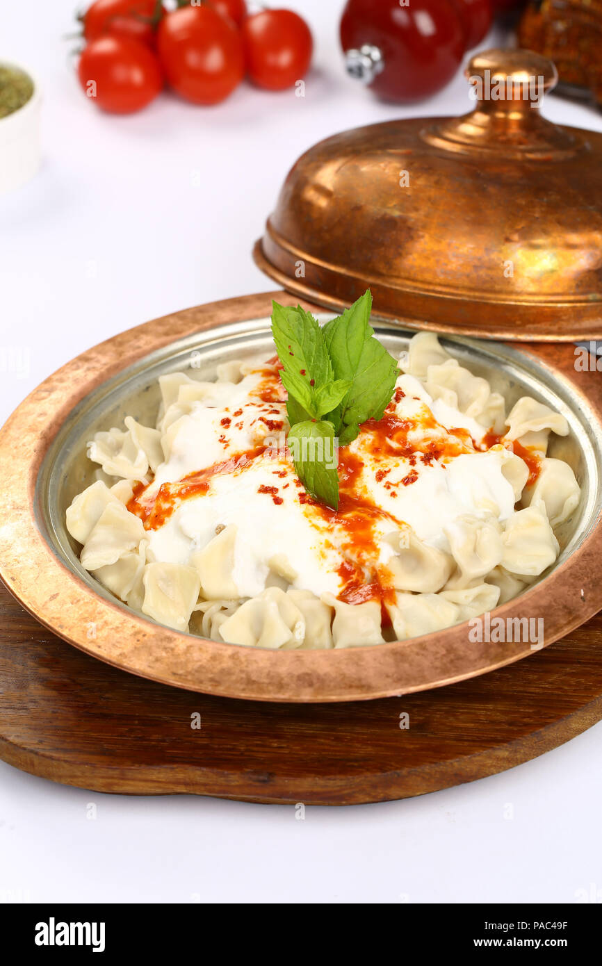 Traditional Turkish Food Manti Ravioli with Yoghurt Stock Photo - Alamy