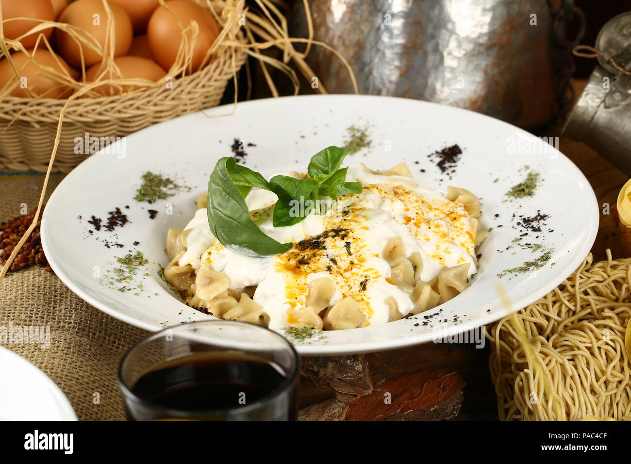 Traditional Turkish Food Manti Ravioli with Yoghurt Stock Photo - Alamy