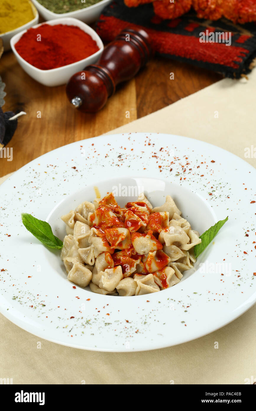 Traditional Turkish Food Manti Ravioli with Yoghurt Stock Photo - Alamy