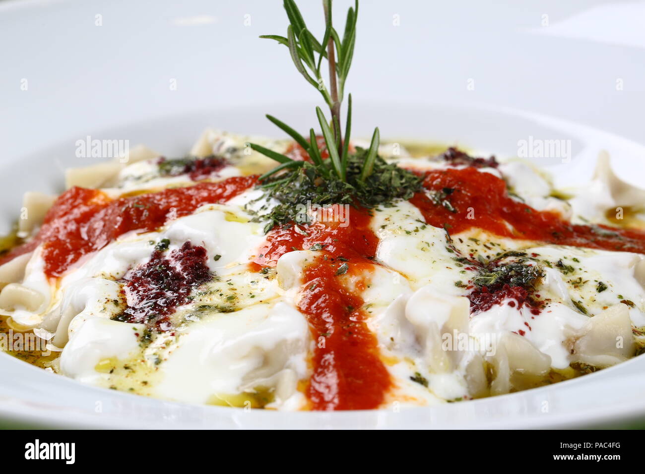 Traditional Turkish Food Manti Ravioli with Yoghurt Stock Photo - Alamy