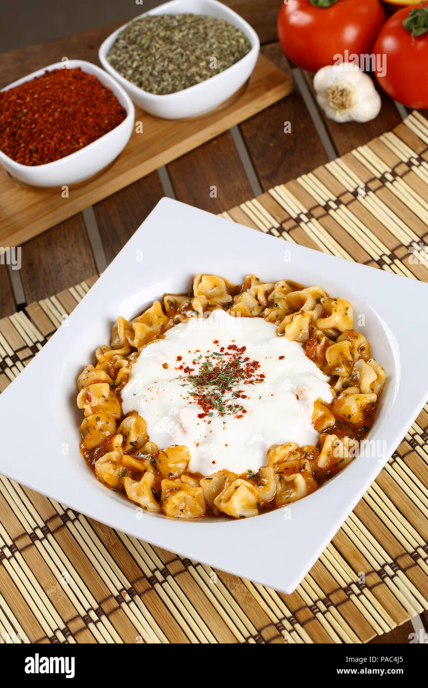 Traditional Turkish Food Manti Ravioli with Yoghurt Stock Photo - Alamy