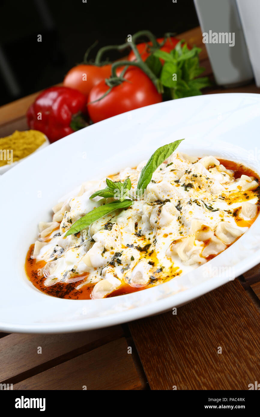 Traditional Turkish Food Manti Ravioli with Yoghurt Stock Photo - Alamy