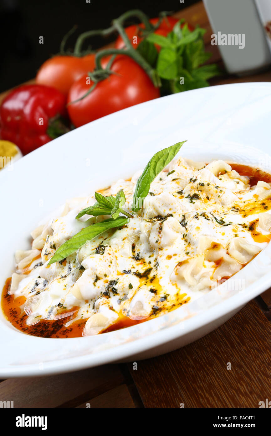Traditional Turkish Food Manti Ravioli with Yoghurt Stock Photo - Alamy