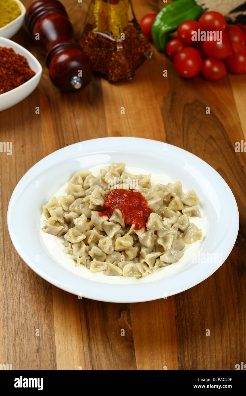 Traditional Turkish Food Manti Ravioli with Yoghurt Stock Photo - Alamy