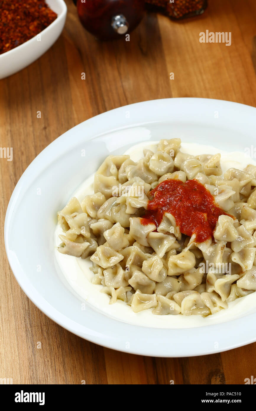 Traditional Turkish Food Manti Ravioli with Yoghurt Stock Photo - Alamy