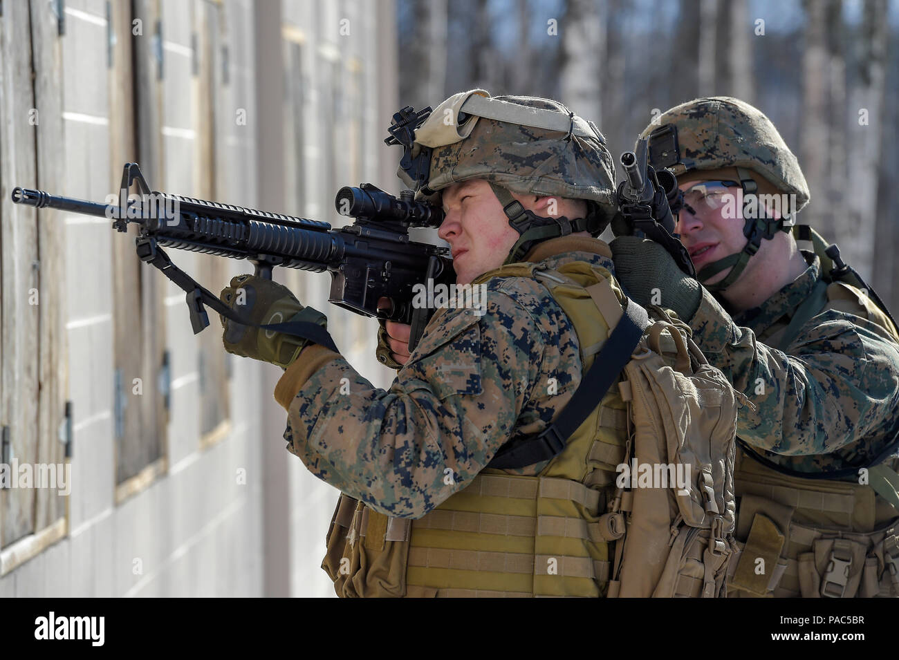 U.S. Marine Corps Cpl. Joseph Myers, left, and Lance Cpl. Jacob Granado ...