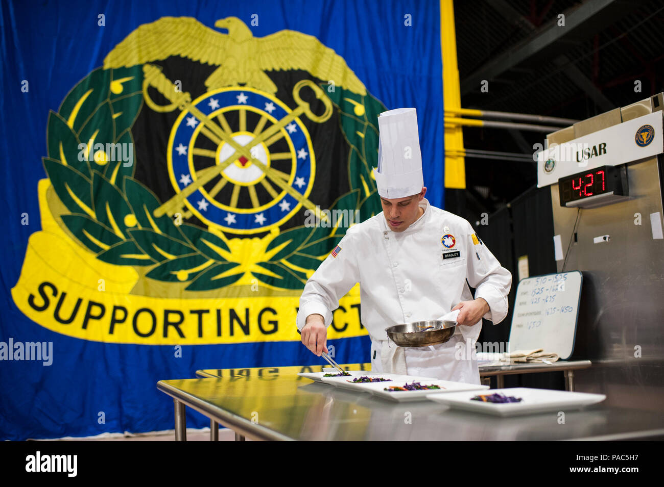 U.S. Army Reserve Culinary Arts Team member Staff Sgt. Orkie Bradley ...