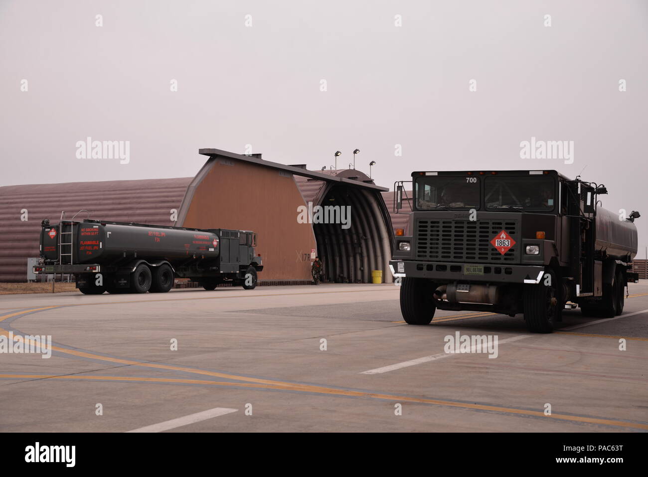 Fuel trucks assigned to the 51st Logistics Readiness Squadron drive to ...