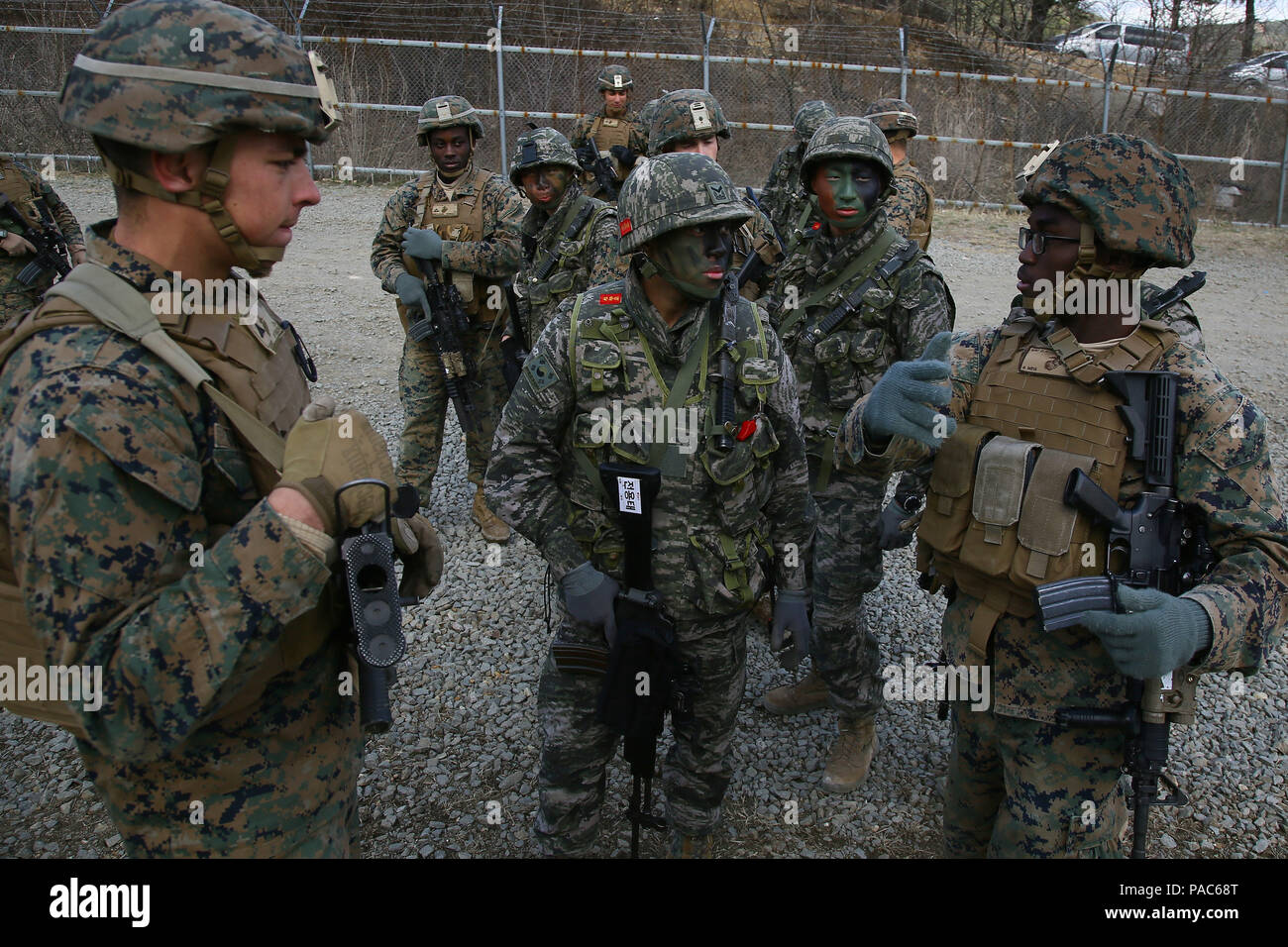 U.S. Marines with 1st Battalion, 3rd Marines – “The Lava Dogs”, discuss ...