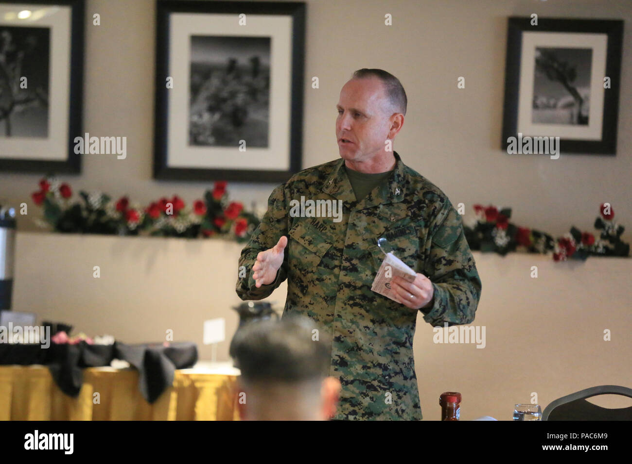 Col. James F. Harp, Combat Center Chief of Staff, explains the ...