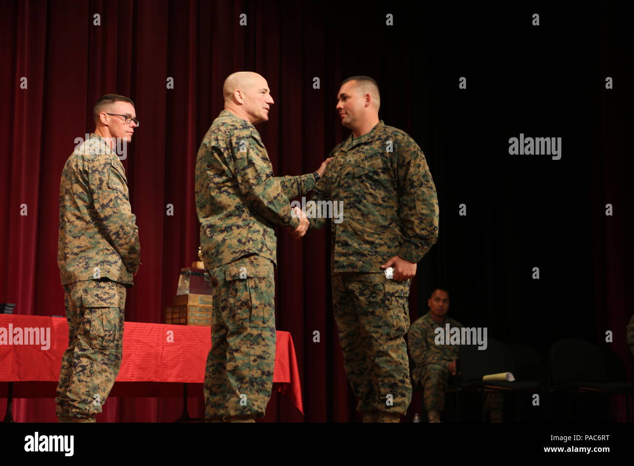 Colonel Darric Knight presents Staff Sgt. Justin Santiago with 2nd ...