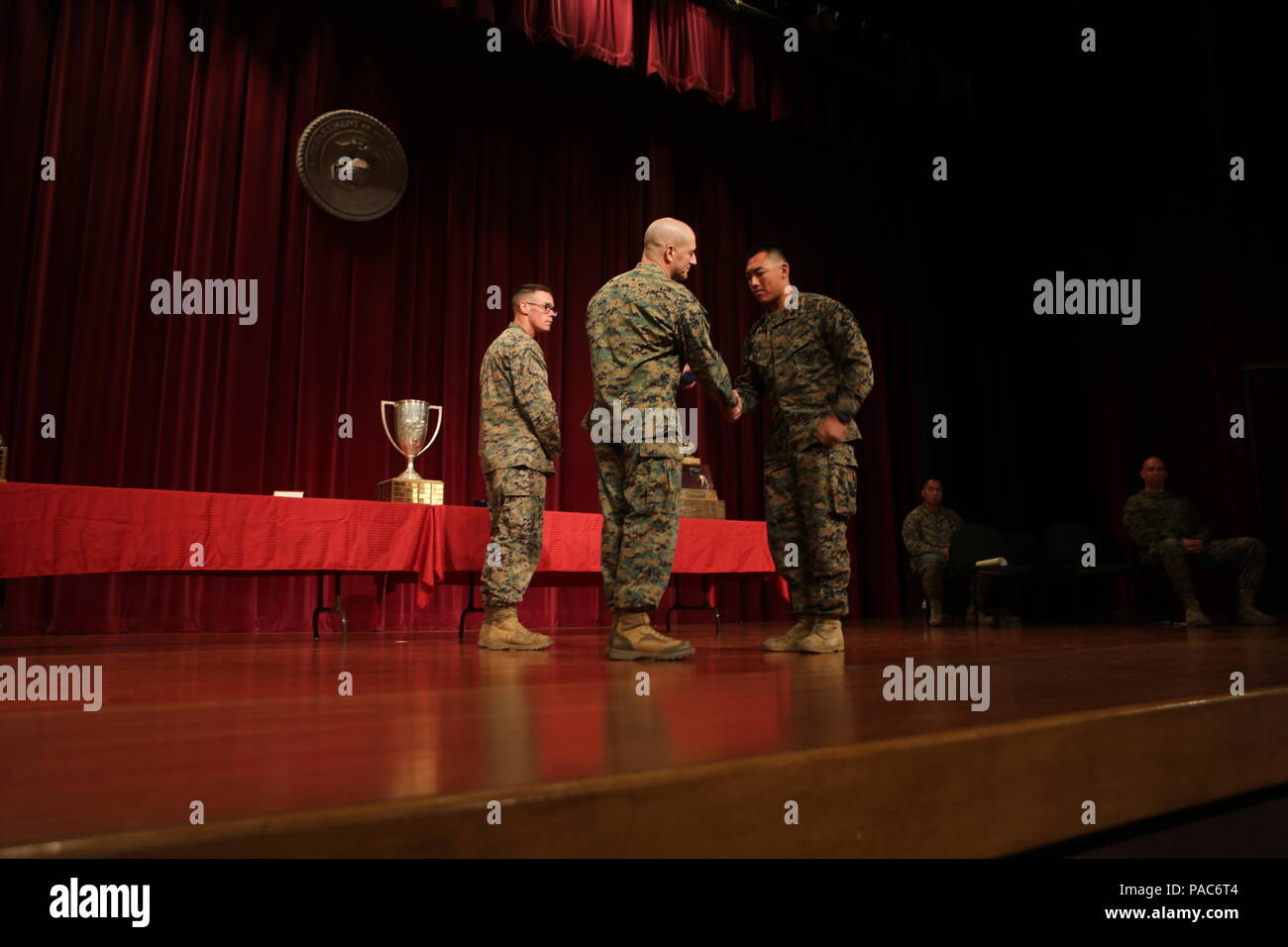 Colonel Darric Knight presents Corporal Alvin Mei 2nd Battalion 23rd ...