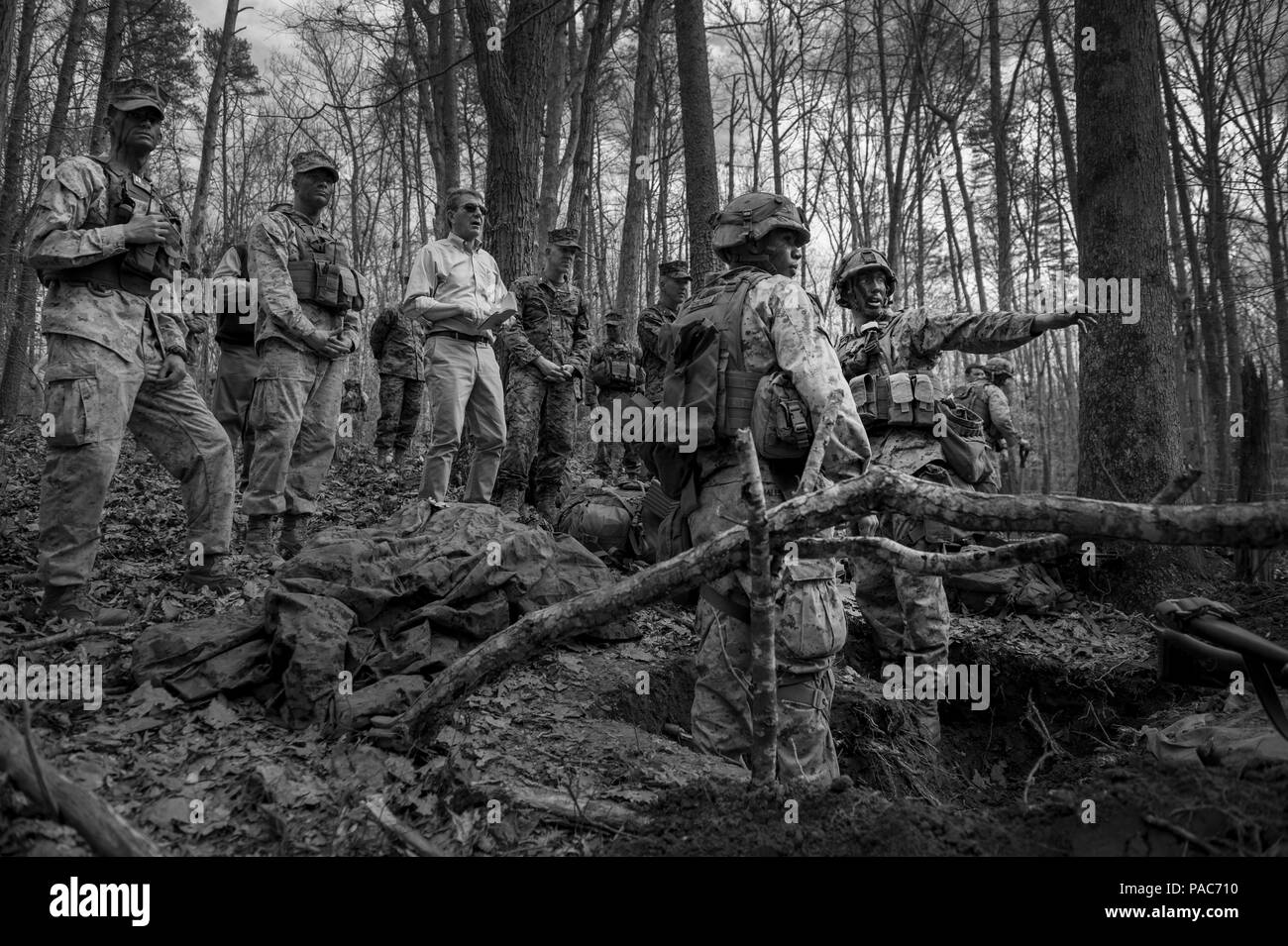 Secretary of Defense Ash Carter observes a platoon in defense ...