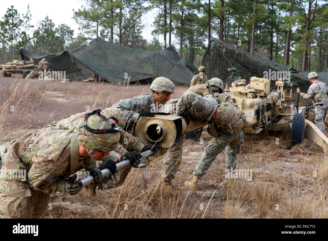 Airborne Artillerymen of the 82nd Airborne Division Artillery maneuver ...