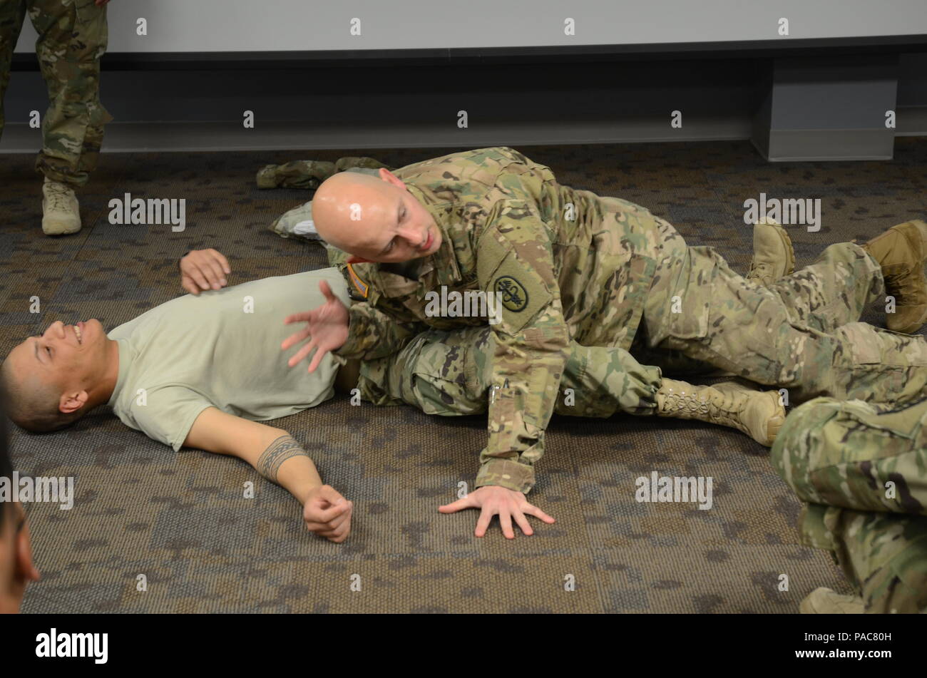 Tending to wounds hi-res stock photography and images - Alamy