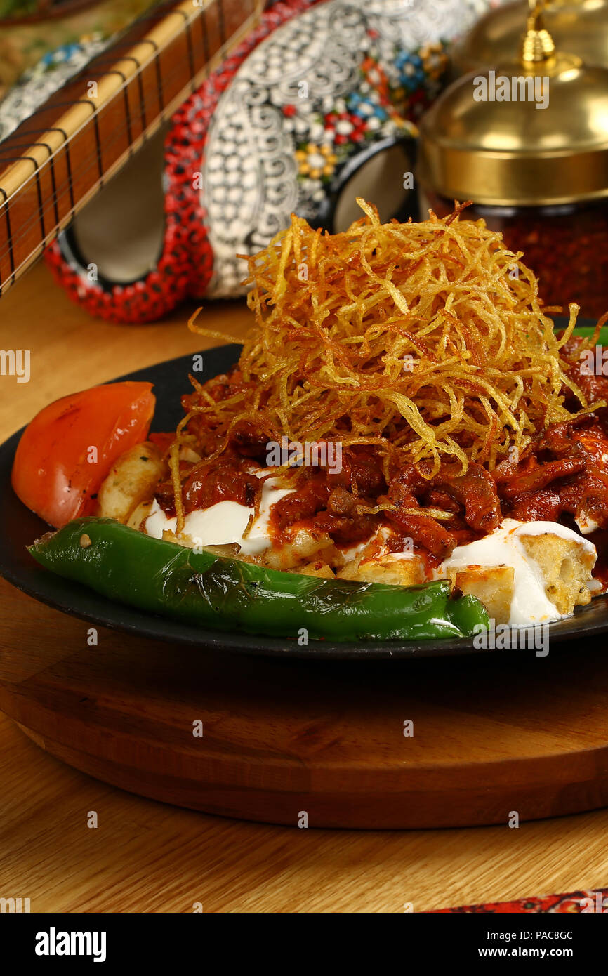 Turkish Meat Kebab with Yogurt and French Fries - Cokertme Kebabi Stock ...