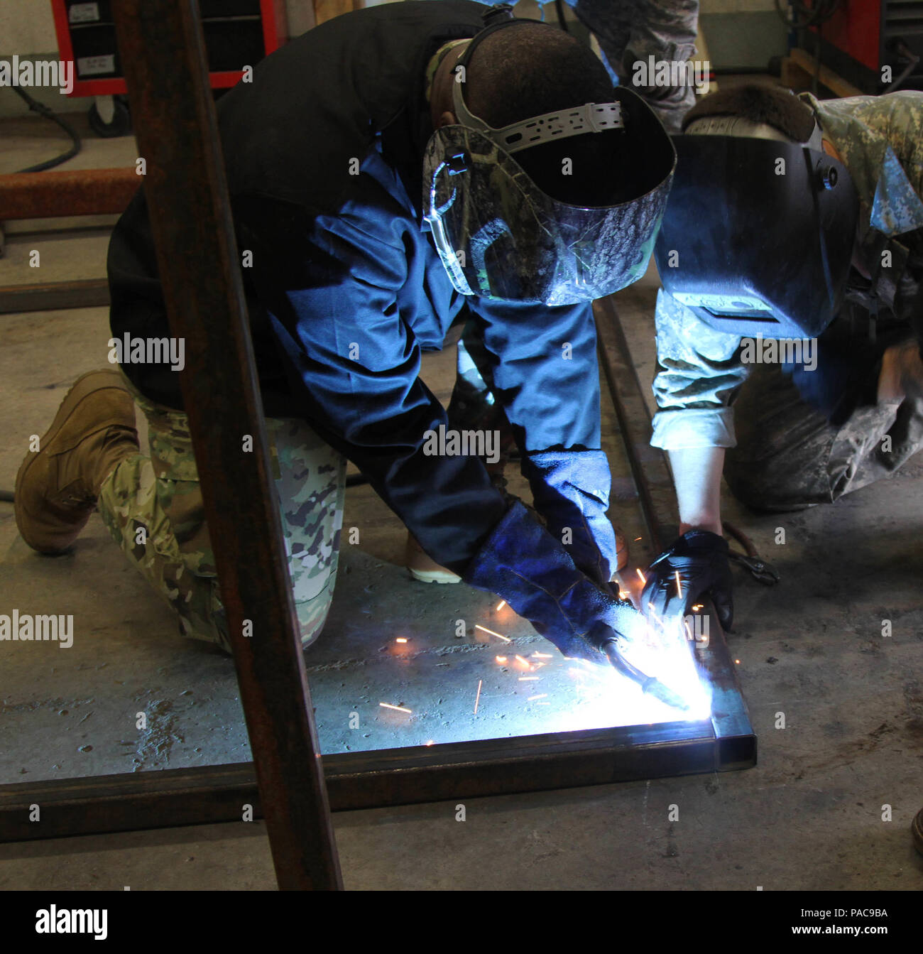 Command Sgt. Maj. Edward C. Morris (left), ordnance command sergeant ...
