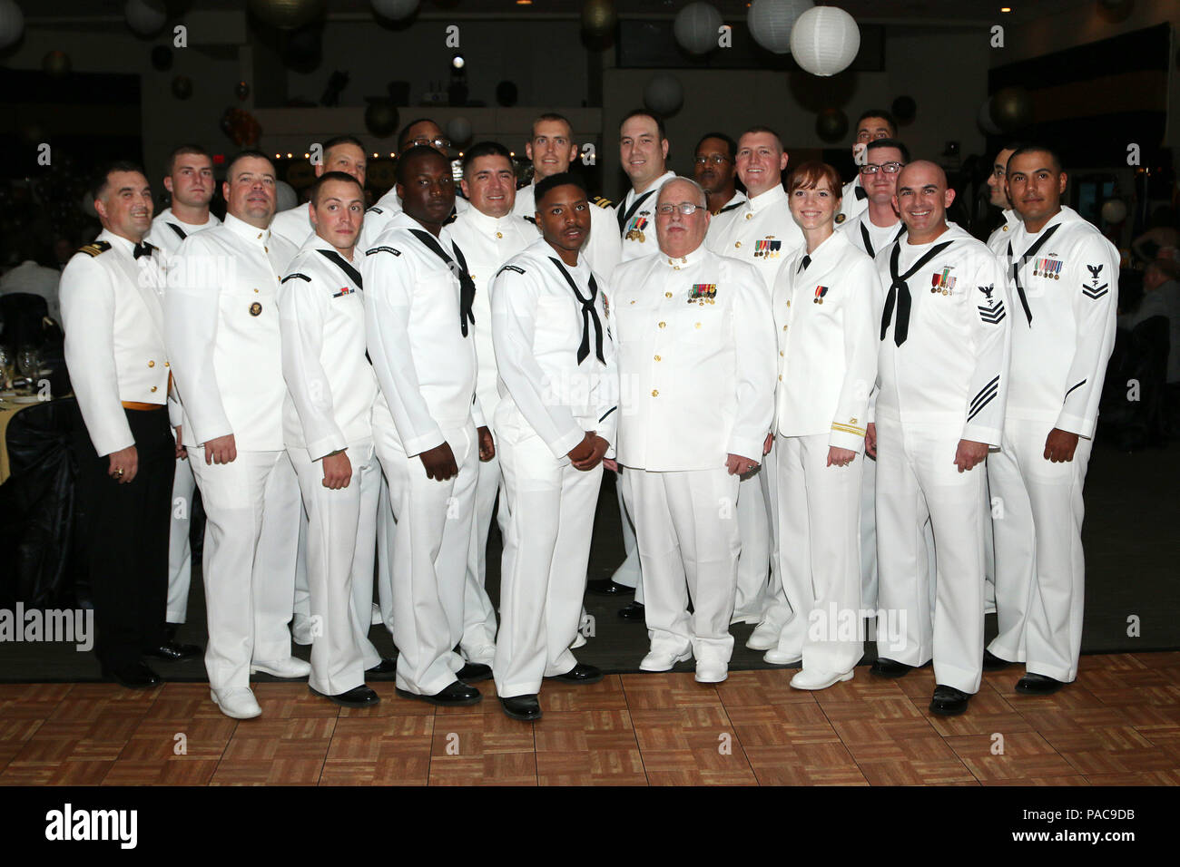 Frank Thompson, center right, stands amongst the U.S. Naval Station ...