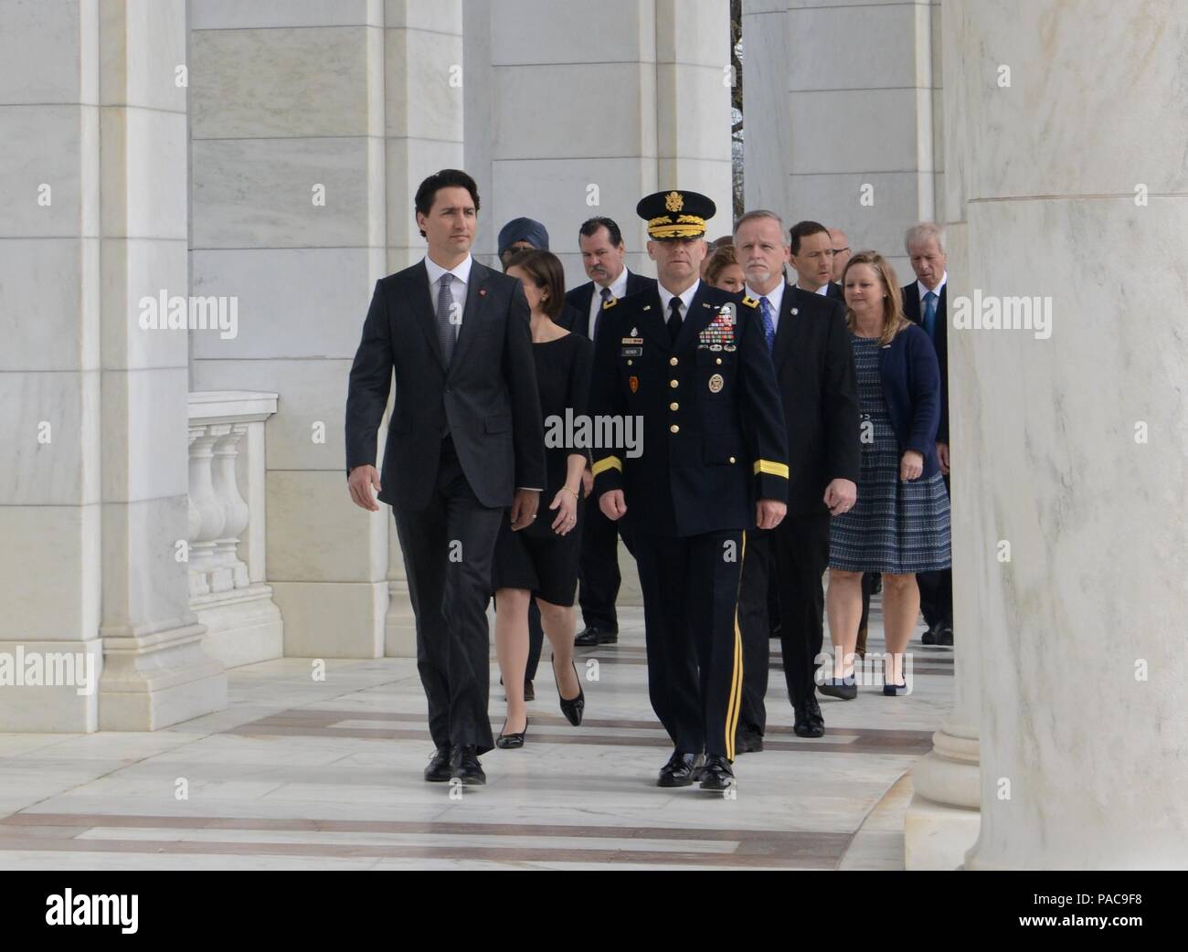 Justin Trudeau, prime minister of Canada, is escorted by Maj. Gen ...