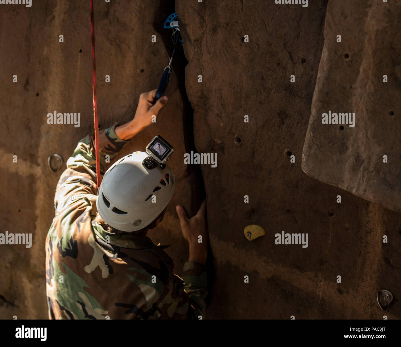A Dutch Marine with the 32nd Raiding Company utilizes a rock climbing ...