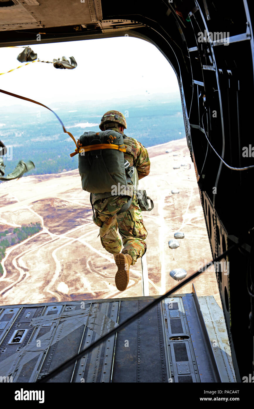 A Paratrooper assigned to the 82nd Airborne Division walks off a Ch-47 ...