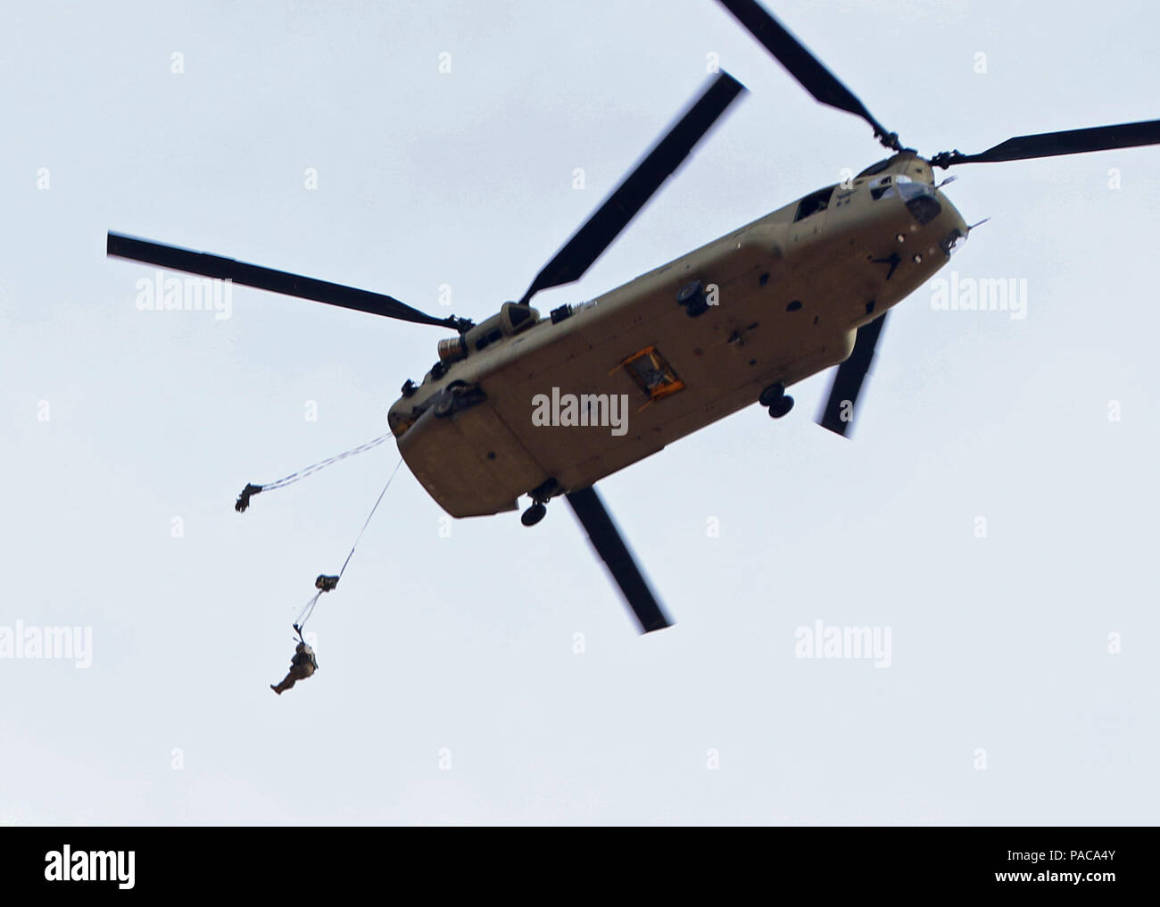 A Paratrooper assigned to the 82nd Airborne Division walks off a Ch-47 ...