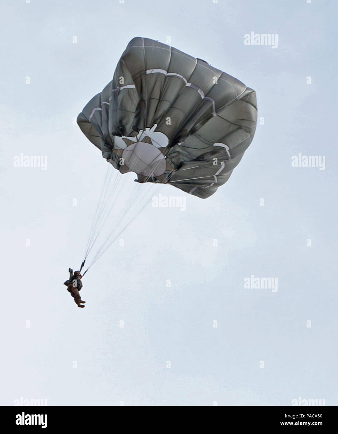 A Paratrooper assigned to the 82nd Airborne Division watches his T-11 ...