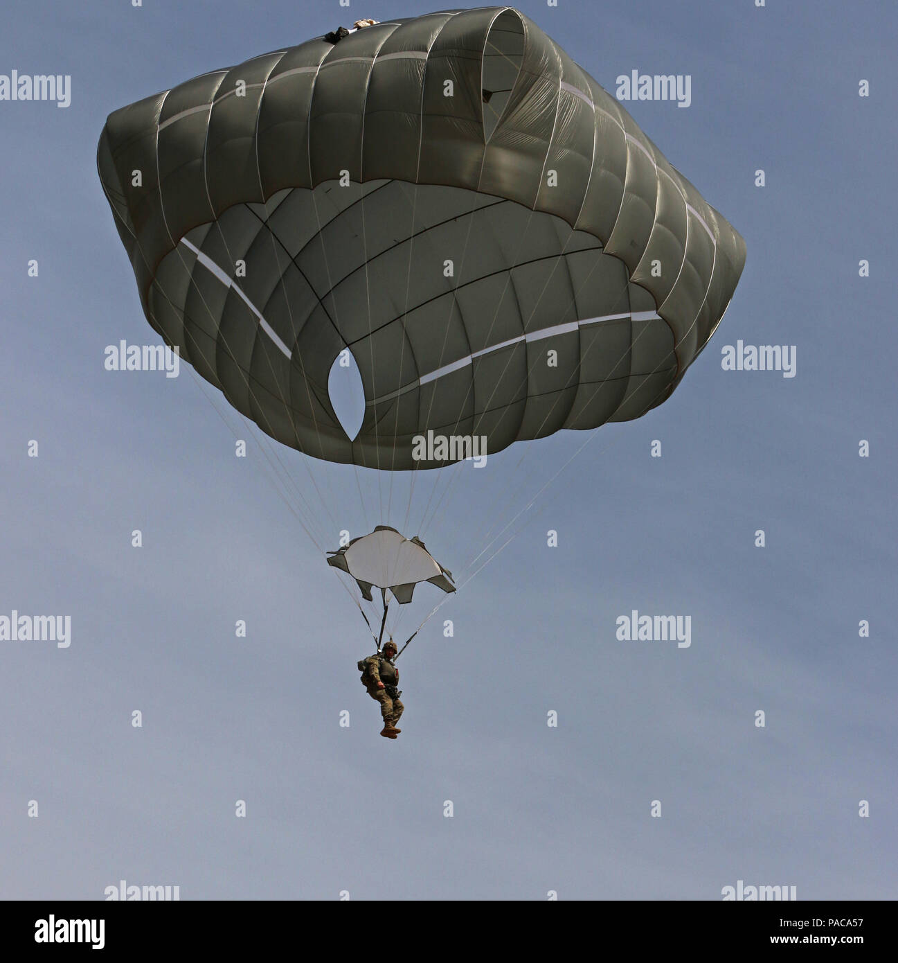 A Paratrooper assigned to the 82nd Airborne Divison enjoys the view ...