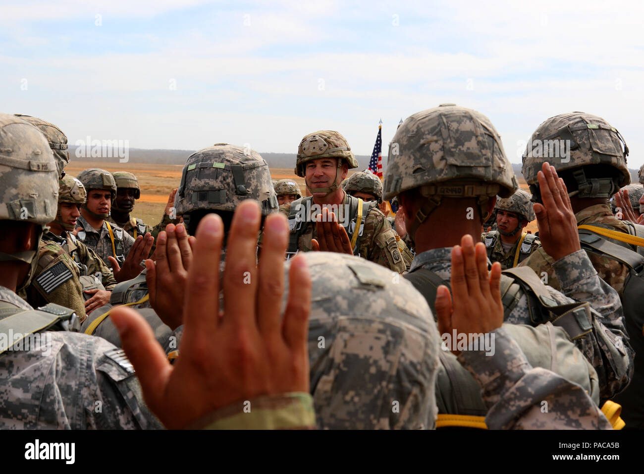 Eighty-two Paratroopers recite the oath of enlistment during a mass ...
