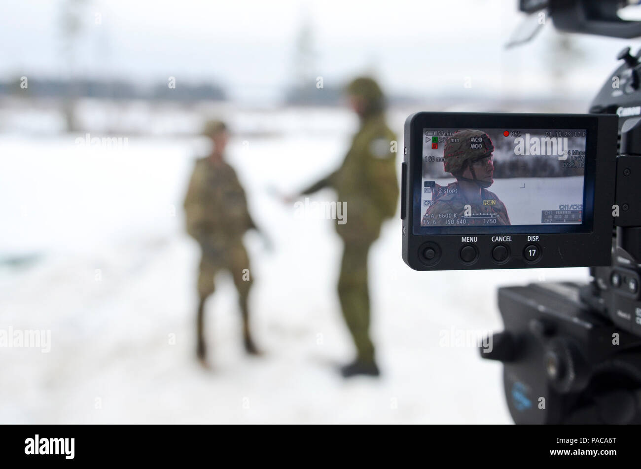 Estonian Army public affairs Soldiers interview Sgt. Samuel Negron, an ...