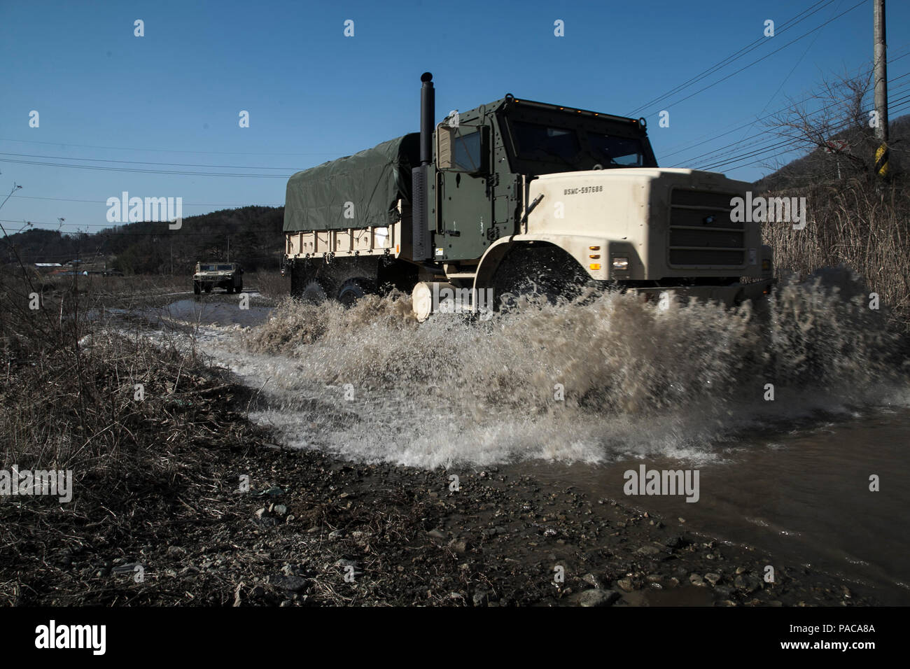 U.S. Marines with Victor Unit 1/3, use tactical vehicles for transport ...