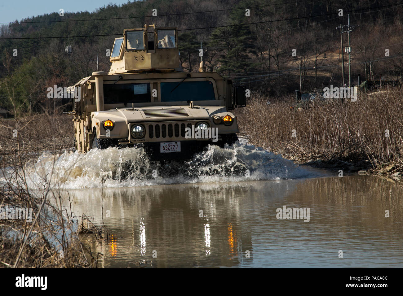 U.S. Marines with Victor Unit 1/3, use tactical vehicles for transport ...