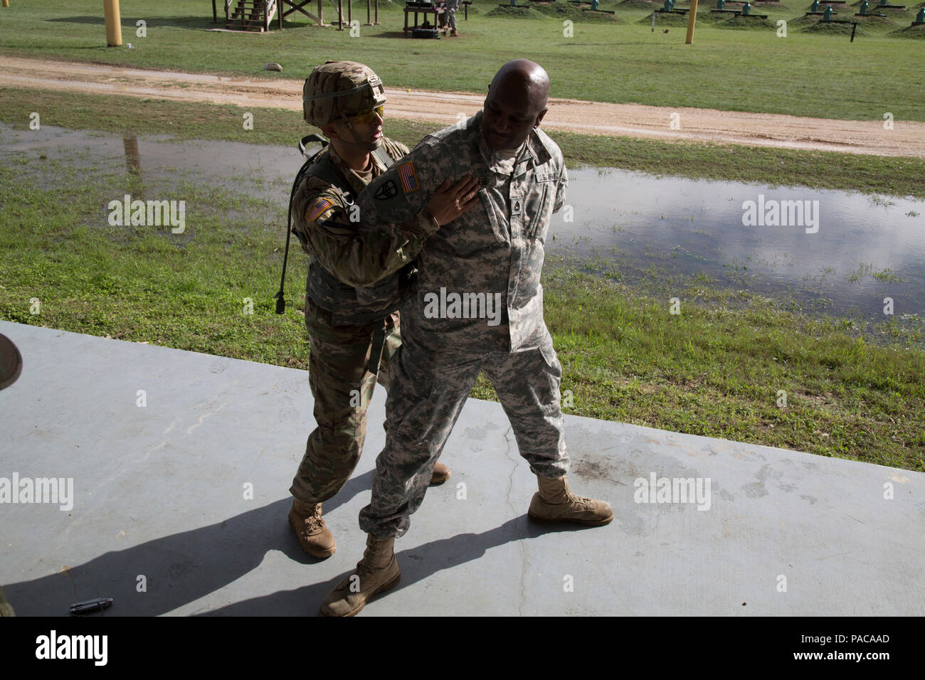 U.S. Army Sgt. 1st Class Daniel Aparicao (left) assigned to RTSM ...