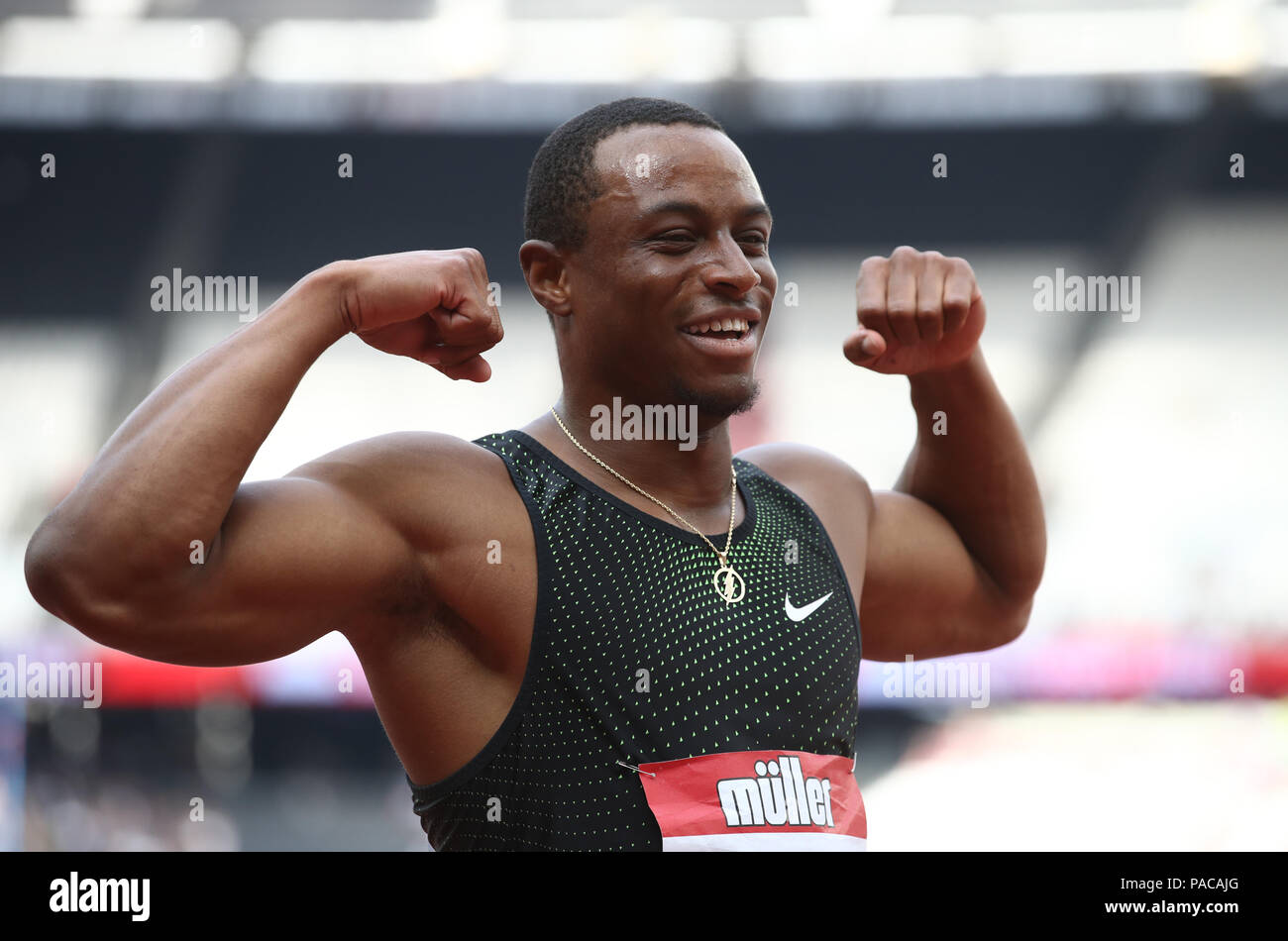 USA's Ronnie Baker (left) celebrates winning the Men's 100m during day ...