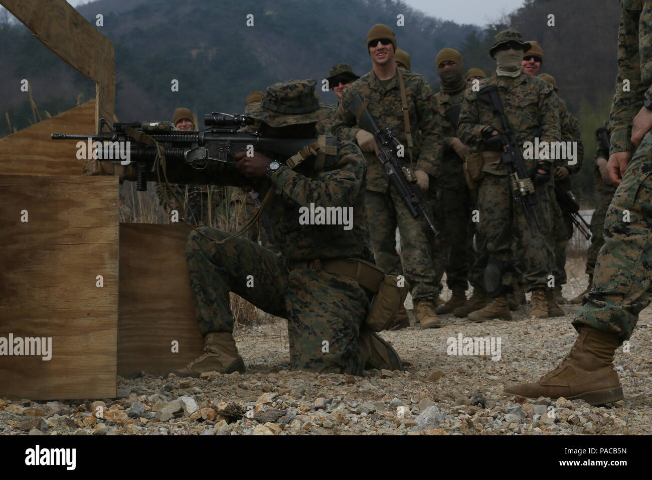 U.S. Marine Sgt. Paris Capers, a combat correspondent with the 13th ...
