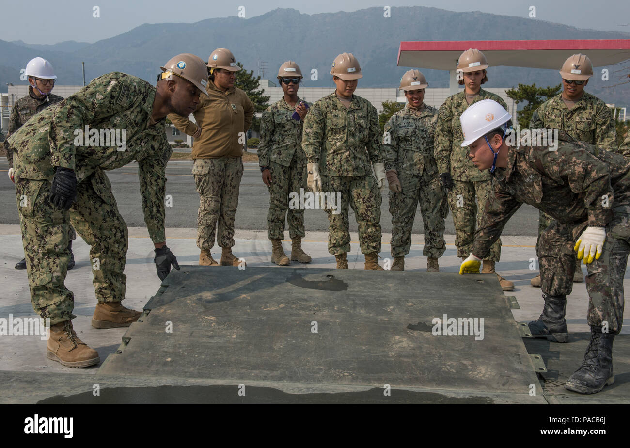 U.S. Navy Utilitiesman 3rd Class Brandon Matthews, from Charleston ...