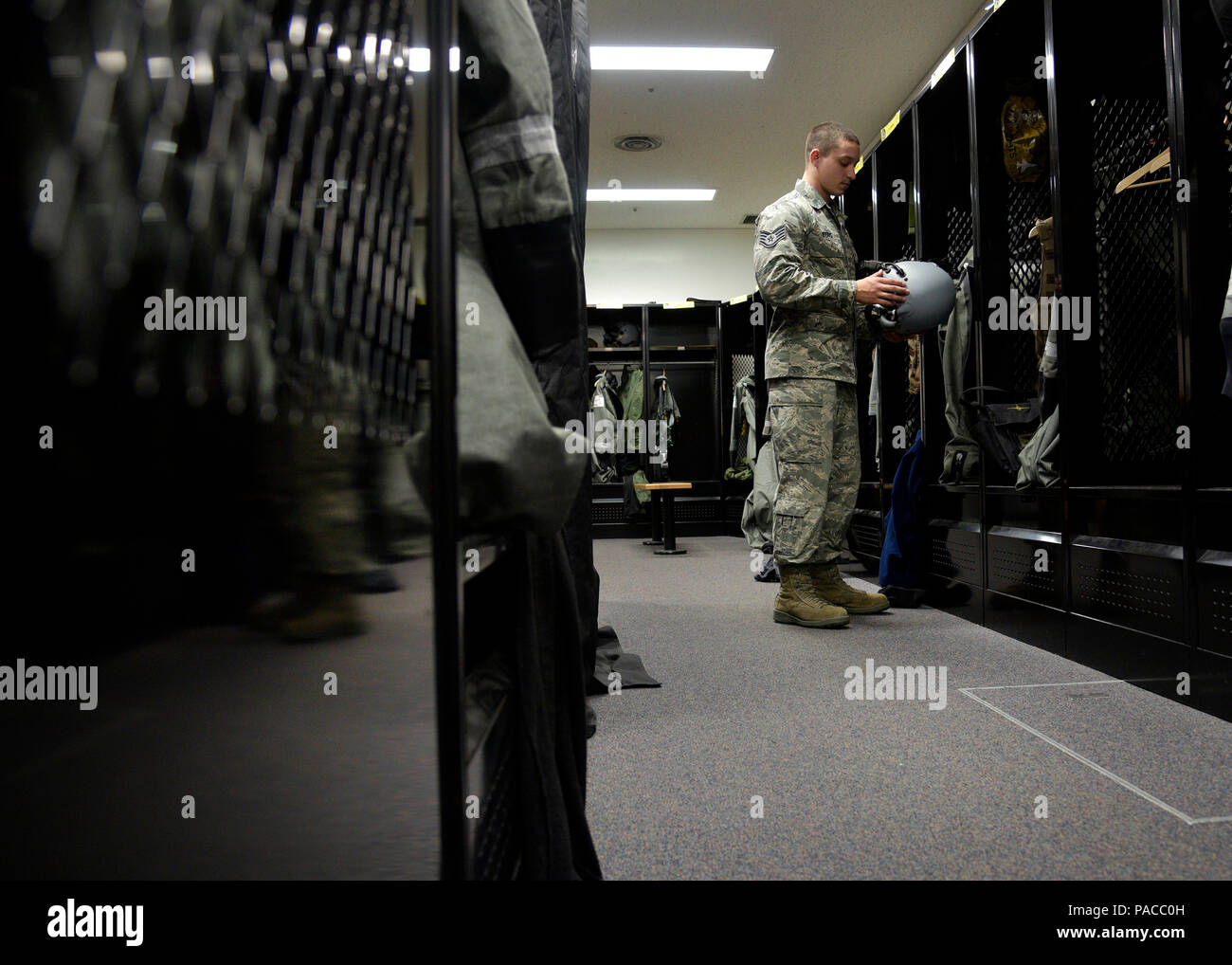 U.S. Air Force Staff Sgt. James Berg, an aircrew flight equipment ...