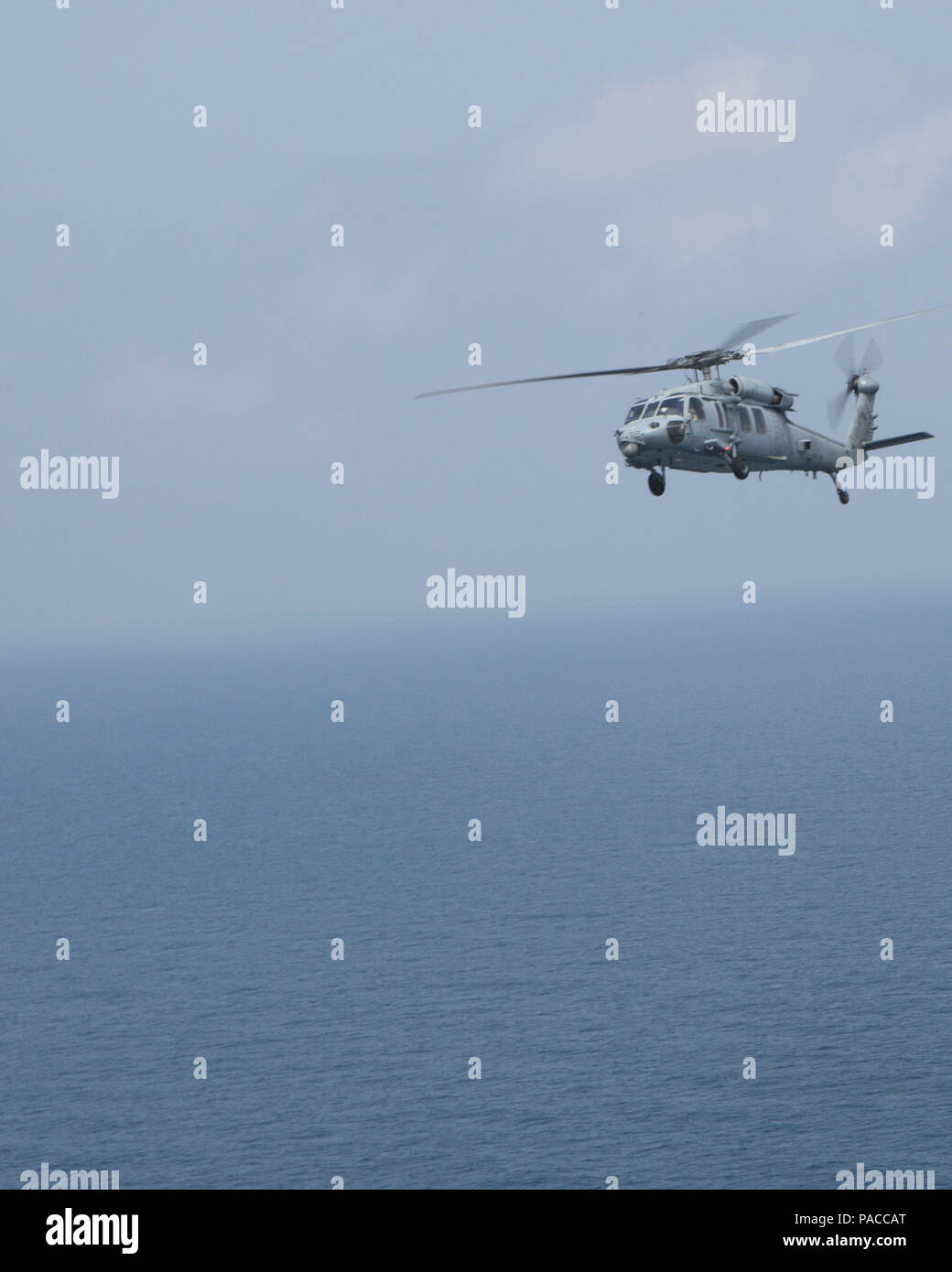 A U.S. Navy MH-60 Sea Hawk assigned to Helicopter Sea Combat Squadron ...