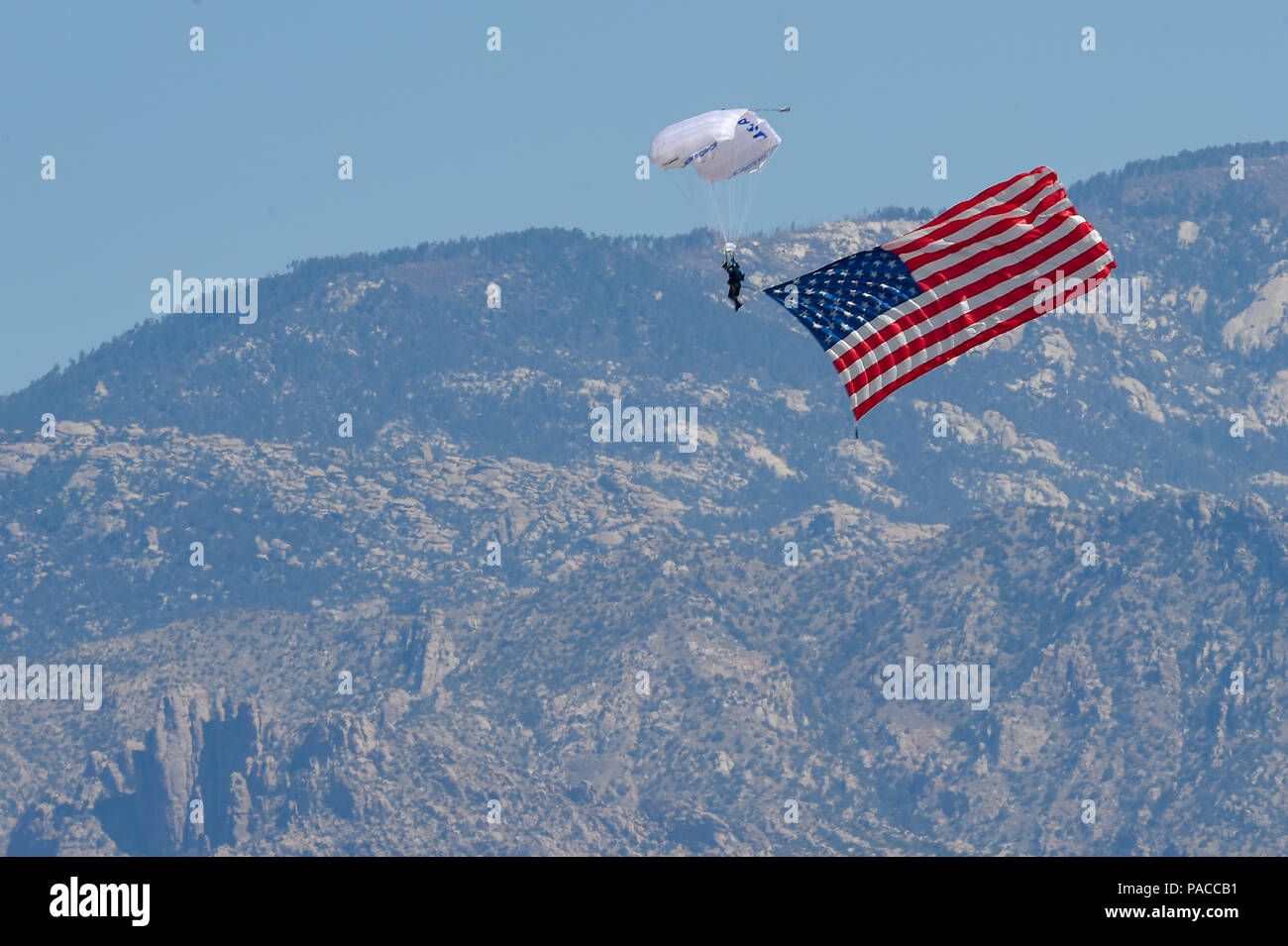 A member of the Wings of Blue U.S. Air Force Skydiving Team descends ...