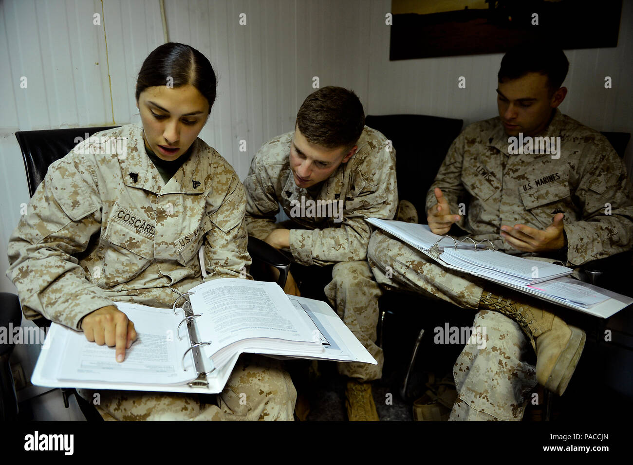 From the left, U.S. Marine Corps Cpls. Caitlyn Coscarelli, Sean Decker ...