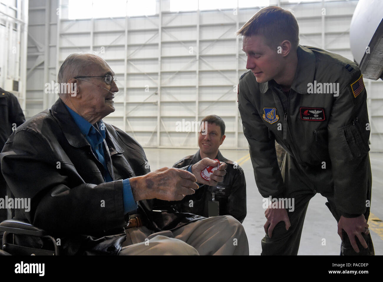 World War II veteran Landon B. Kelly interacts with U.S. Air Force Capt ...